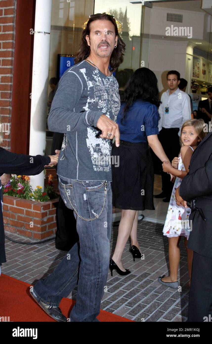 Lorenzo Lamas and his daughters attend the grand opening party for ...