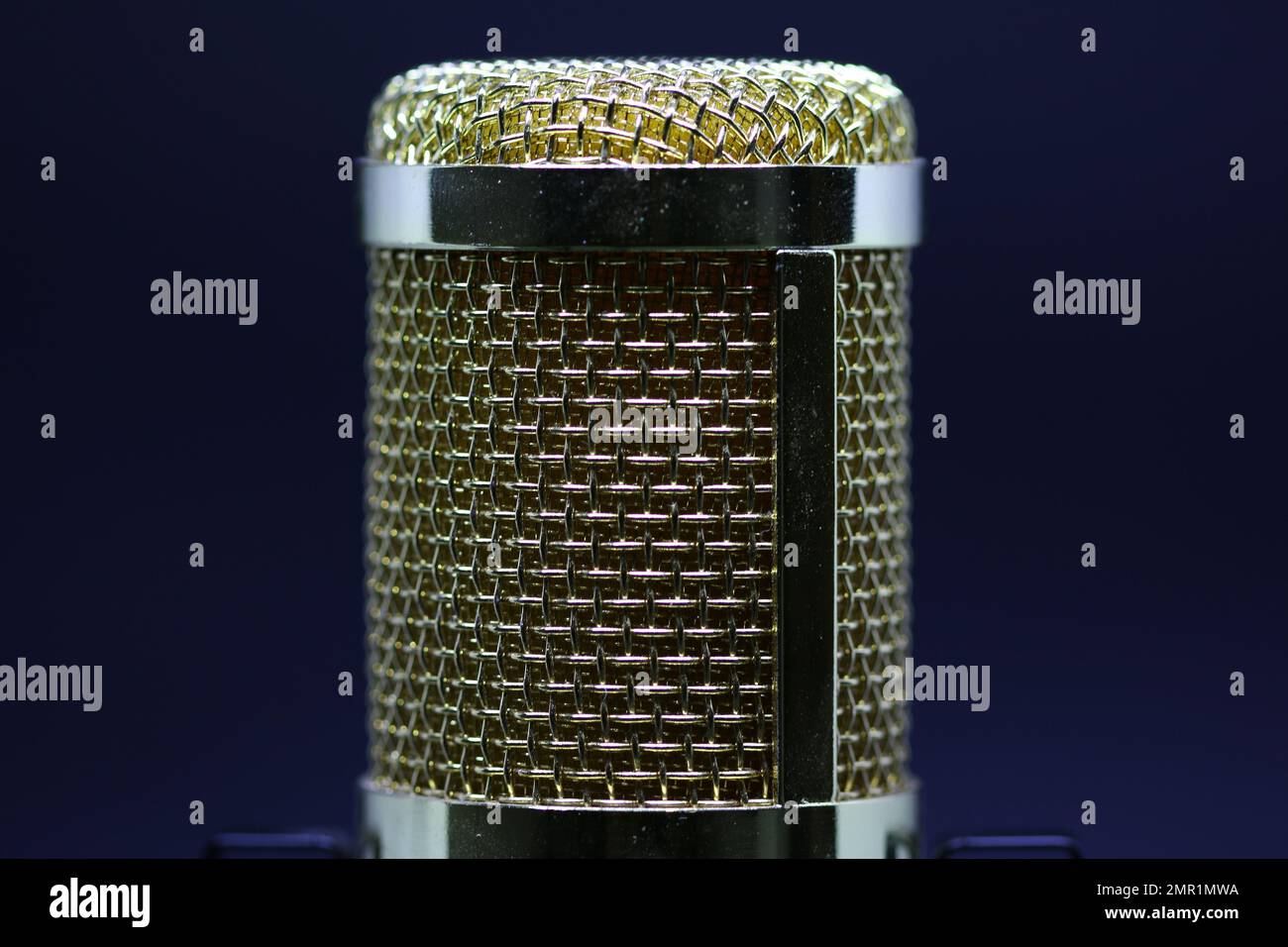 Condenser microphone with gold accents Stock Photo - Alamy