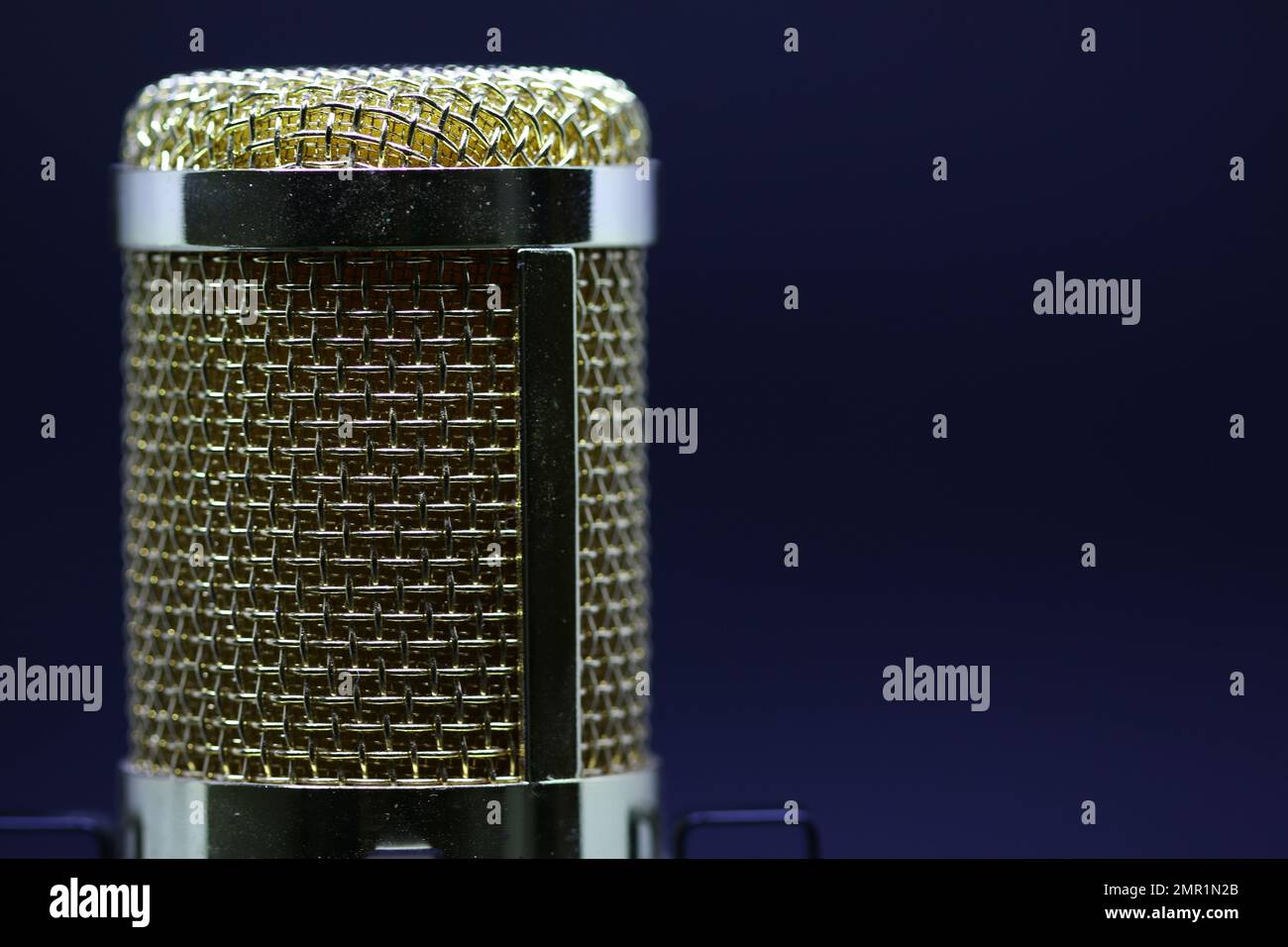 Condenser microphone with gold accents Stock Photo - Alamy