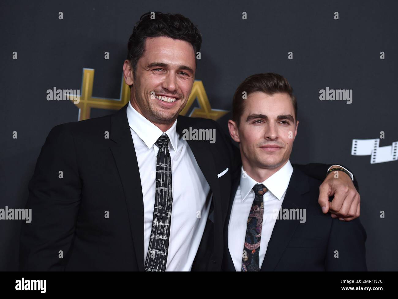 James Franco, left, and Dave Franco arrive at the Hollywood Film Awards ...