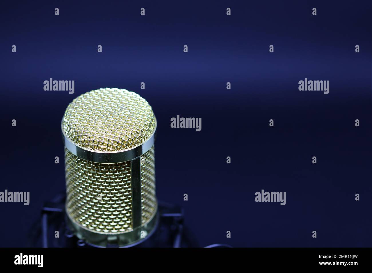 Condenser microphone with gold accents Stock Photo - Alamy