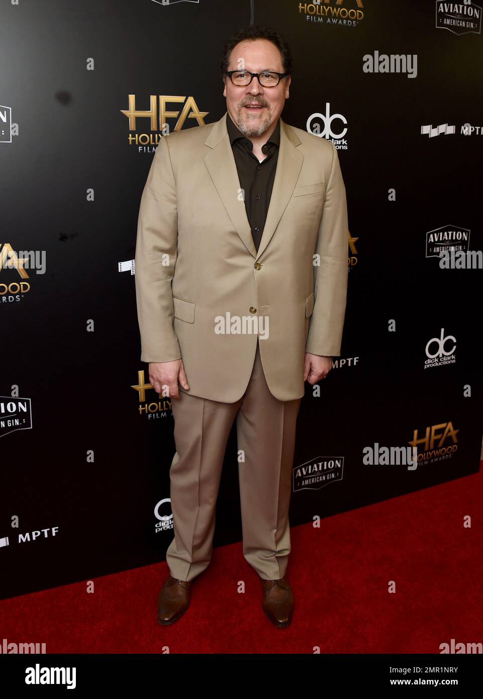 Jon Favreau poses in the press room at the Hollywood Film Awards at the ...
