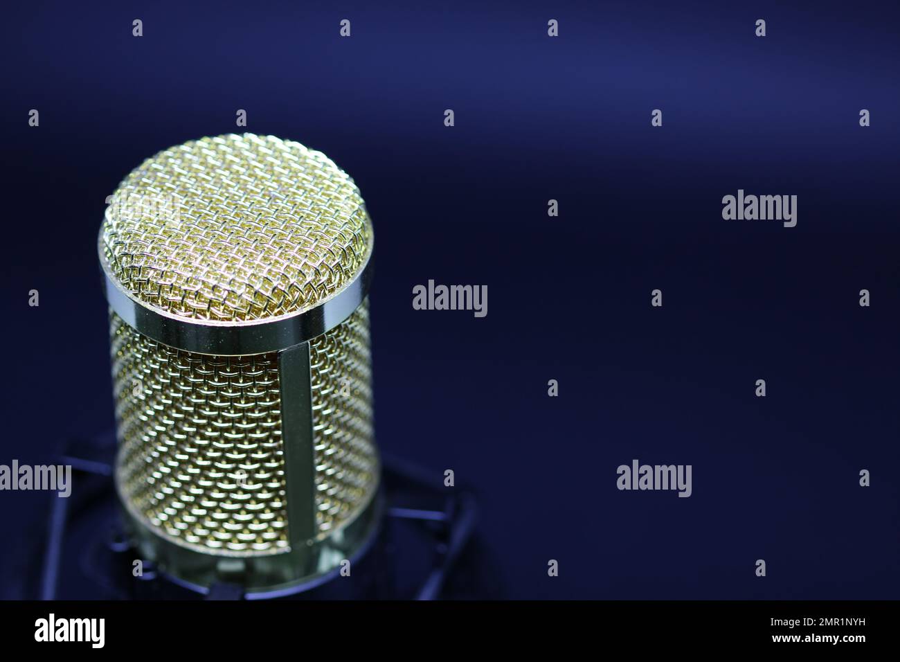 Condenser microphone with gold accents Stock Photo - Alamy
