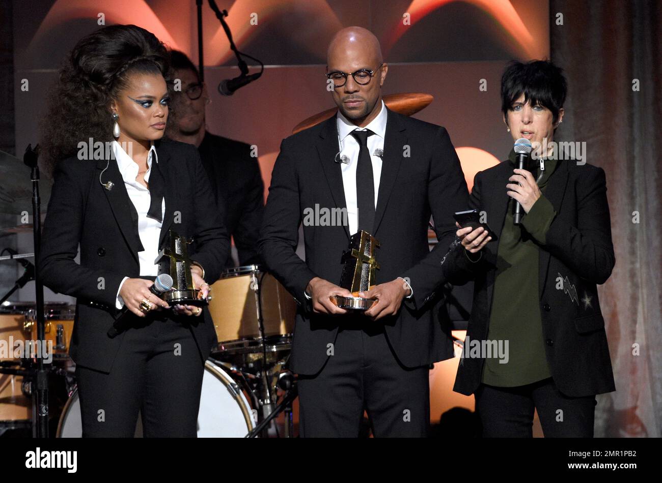Andra Day, from left, Common, and Diane Warren accept the Hollywood ...