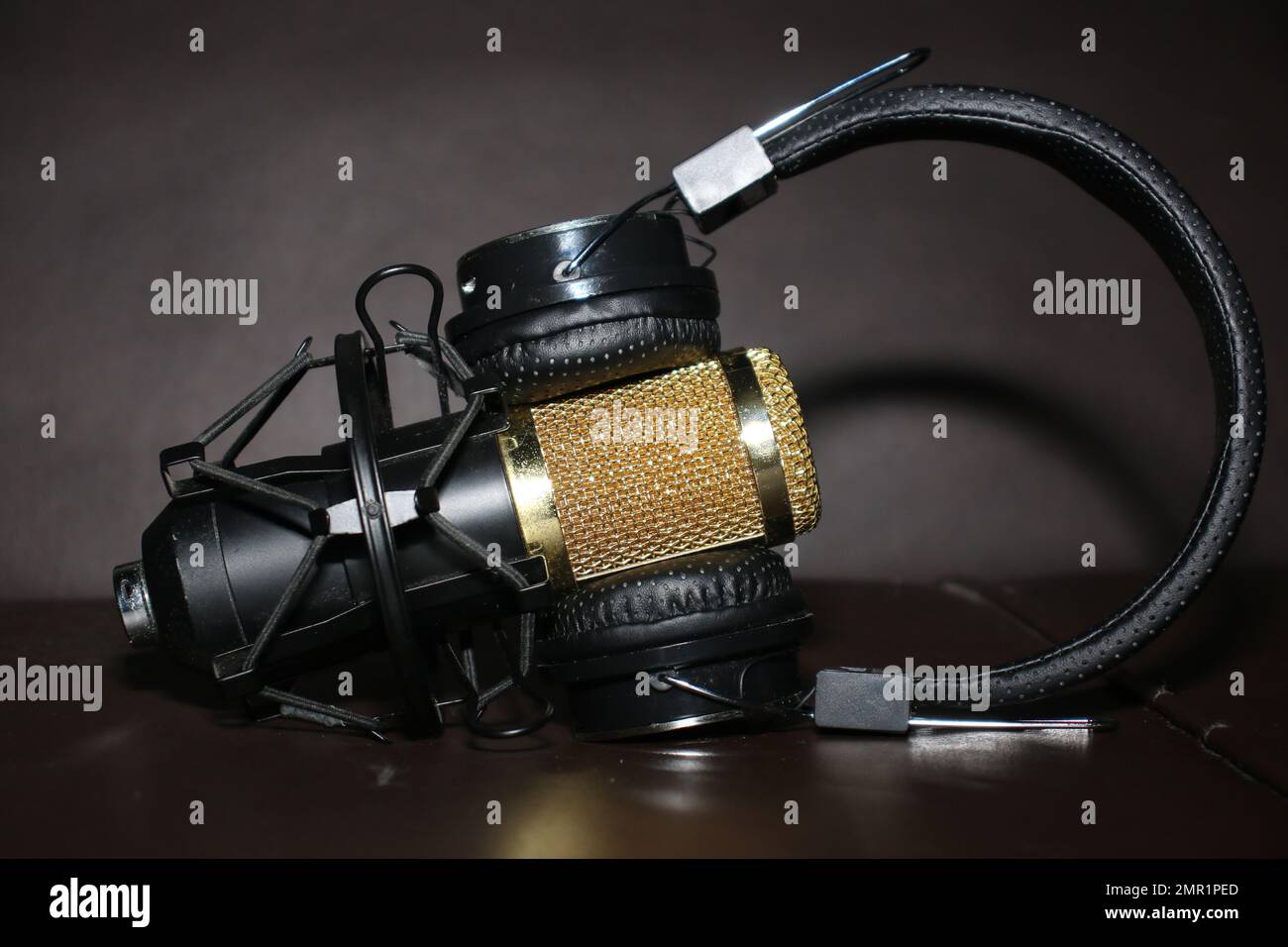 Condenser microphone with gold accents Stock Photo - Alamy
