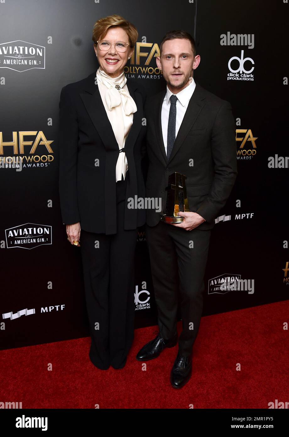 Annette Bening, left, poses in the press room with Jamie Bell, winner ...