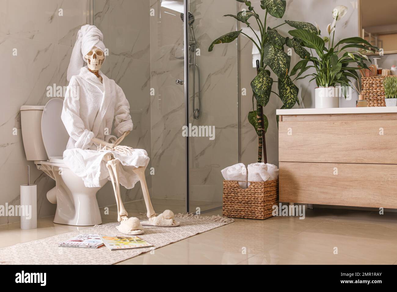 Sitting on toilet hi-res stock photography and images - Alamy