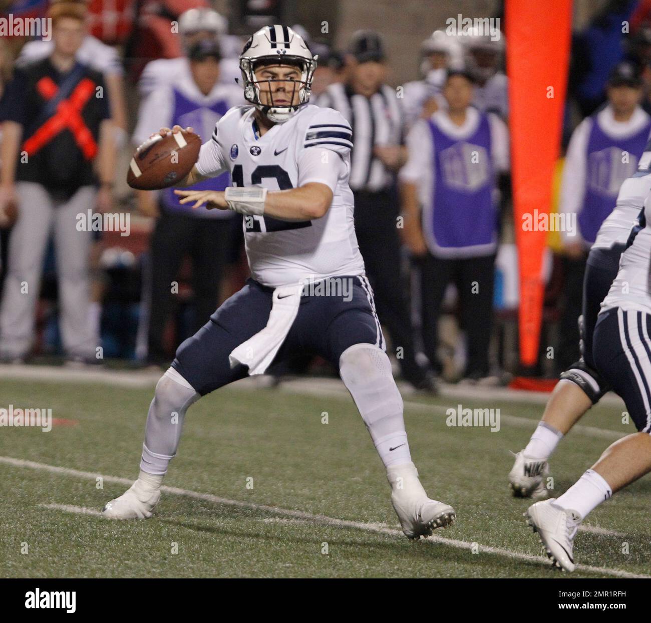 BYU's quarterback Tanner Mangum drops back to pass against Fresno State ...