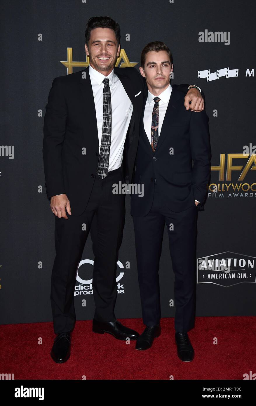 James Franco, left, and Dave Franco arrive at the Hollywood Film Awards ...