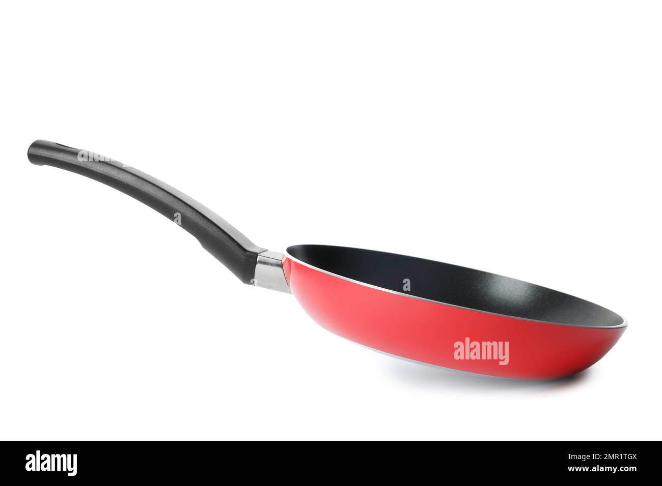 Modern red frying pan isolated on white Stock Photo - Alamy