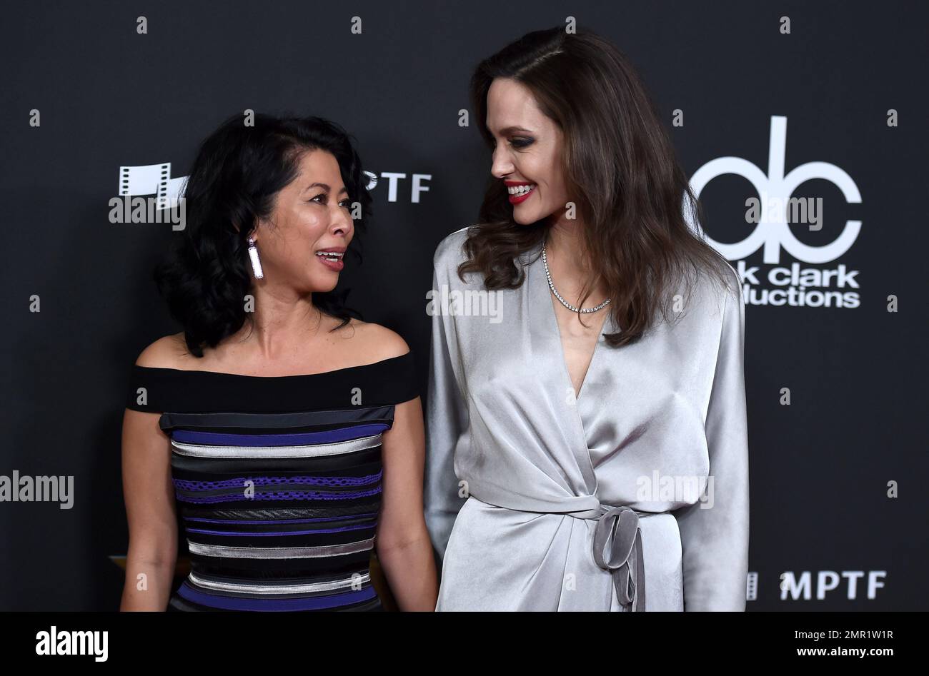 Angelina Jolie, right, and Loung Ung arrive at the Hollywood Film ...