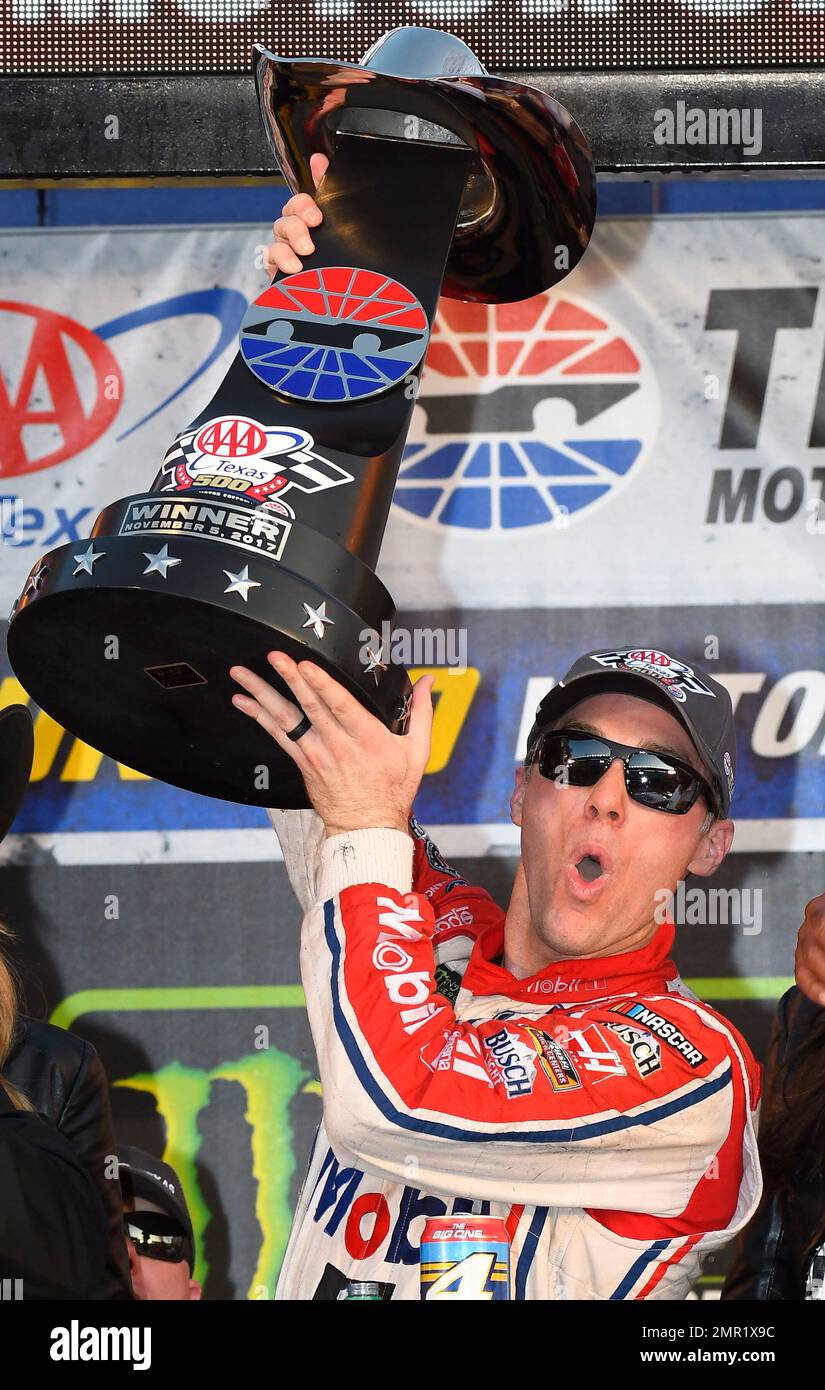 Kevin Harvick celebrates in victory lane after winning the NASCAR Cup ...