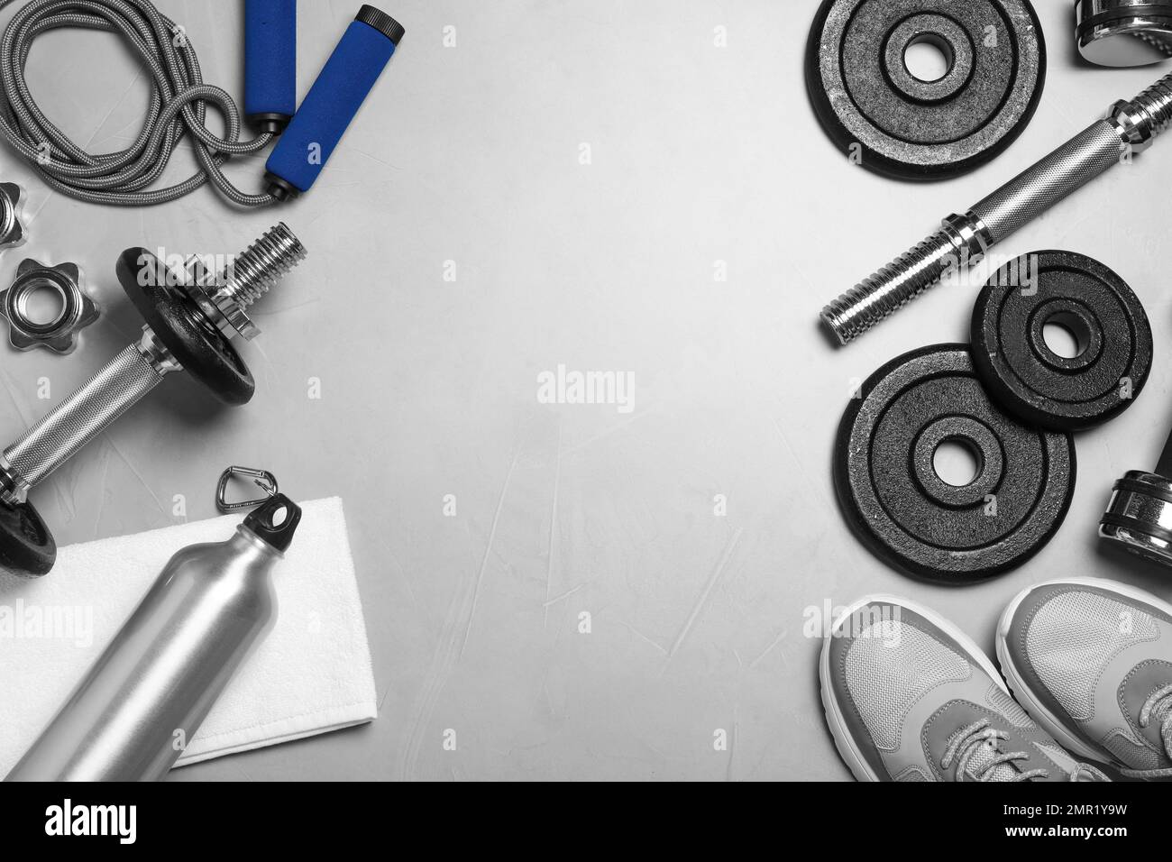 Gym equipment on light grey background, flat lay Stock Photo - Alamy