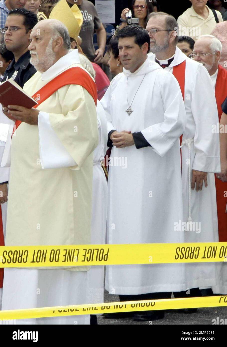 Father Alberto Cutie is greeted by crowds outside the Episcopal Church ...