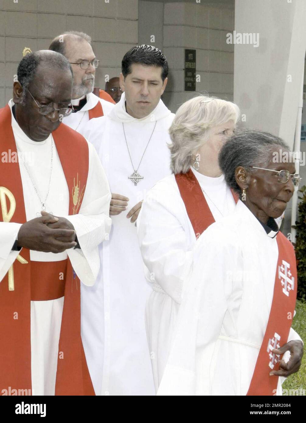 Father Alberto Cutie is greeted by crowds outside the Episcopal Church ...