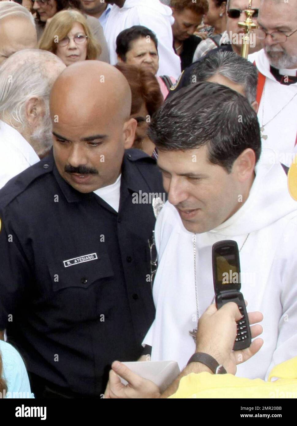 Father Alberto Cutie is greeted by crowds outside the Episcopal Church ...