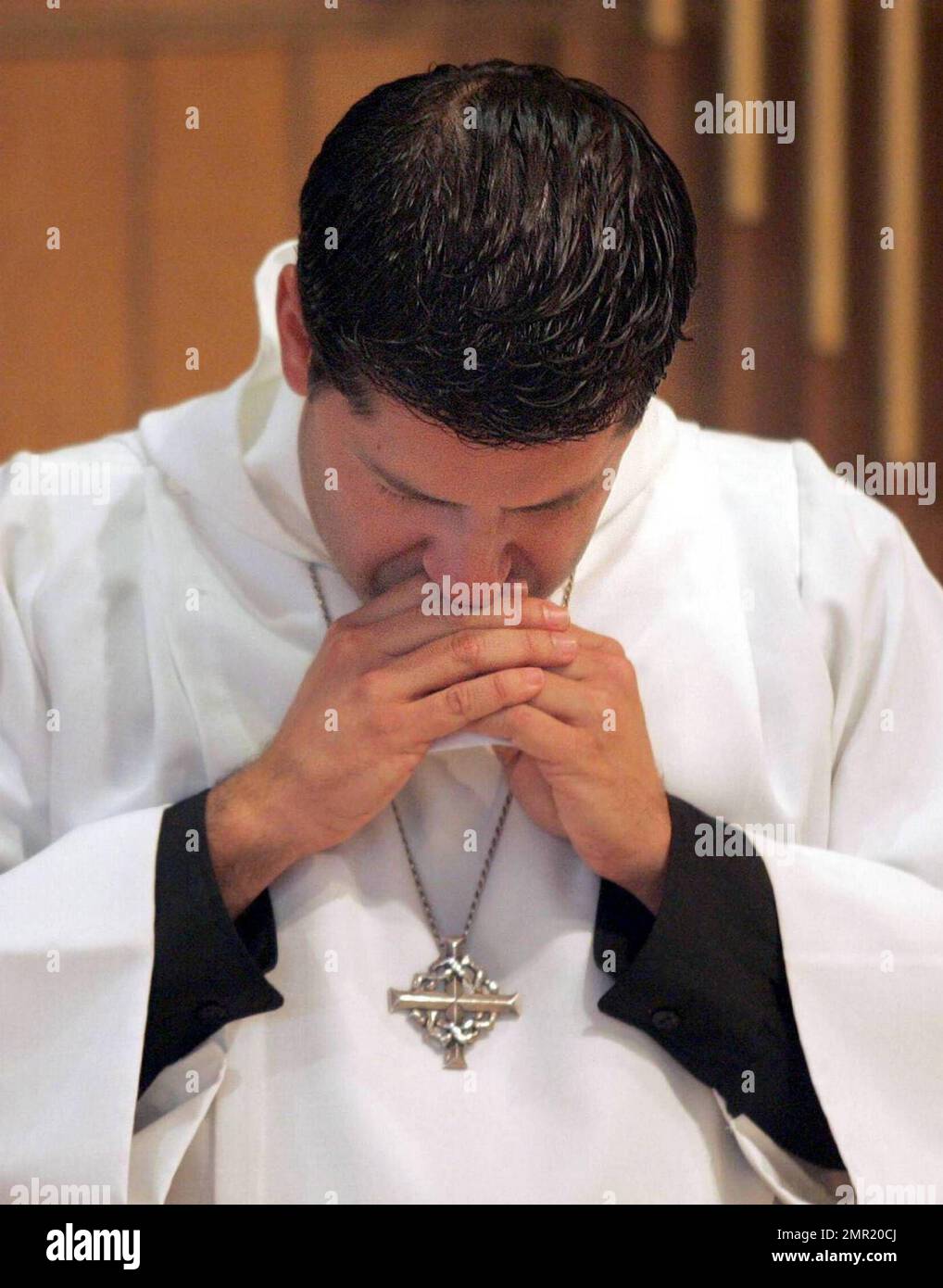 POOL PHOTO - Father Alberto Cutie is greeted by crowds outside the ...