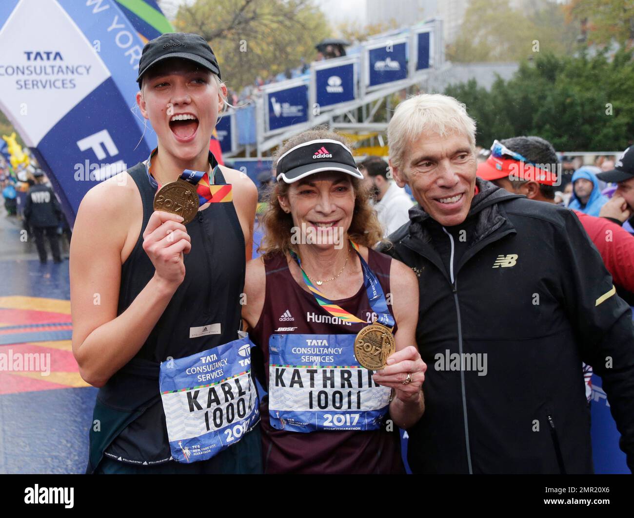 Model Karlie Kloss, left, poses for a picture with marathoner Kathrine ...