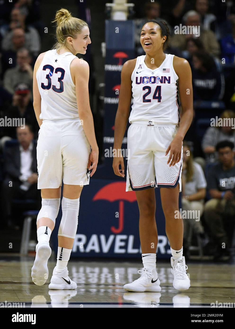 Connecticut's Katie Lou Samuelson (33) and Napheesa Collier (24) react ...