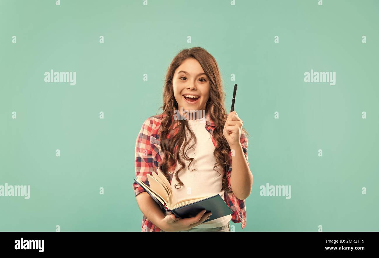 inspired with idea teen girl study with book. child holding copybooks ...