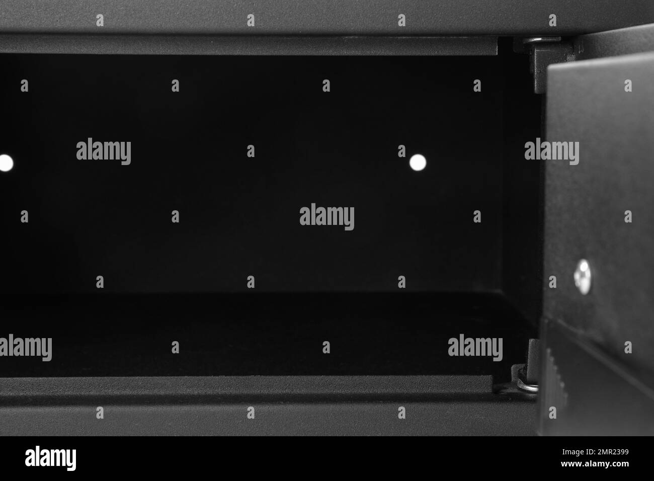 Modern open empty black steel safe, closeup Stock Photo - Alamy