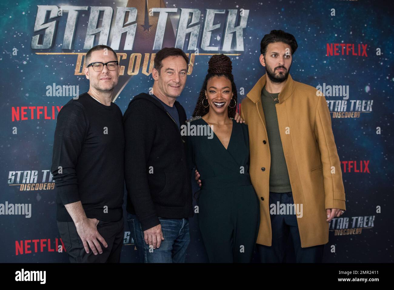 From left, producer Aaron Harberts, actors Jason Isaacs, Sonequa Martin ...