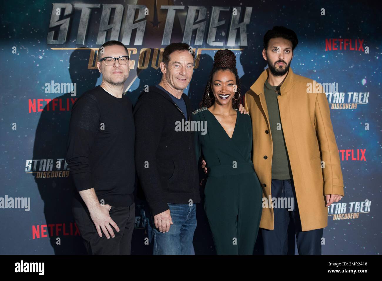 From left, producer Aaron Harberts, actors Jason Isaacs, Sonequa Martin ...