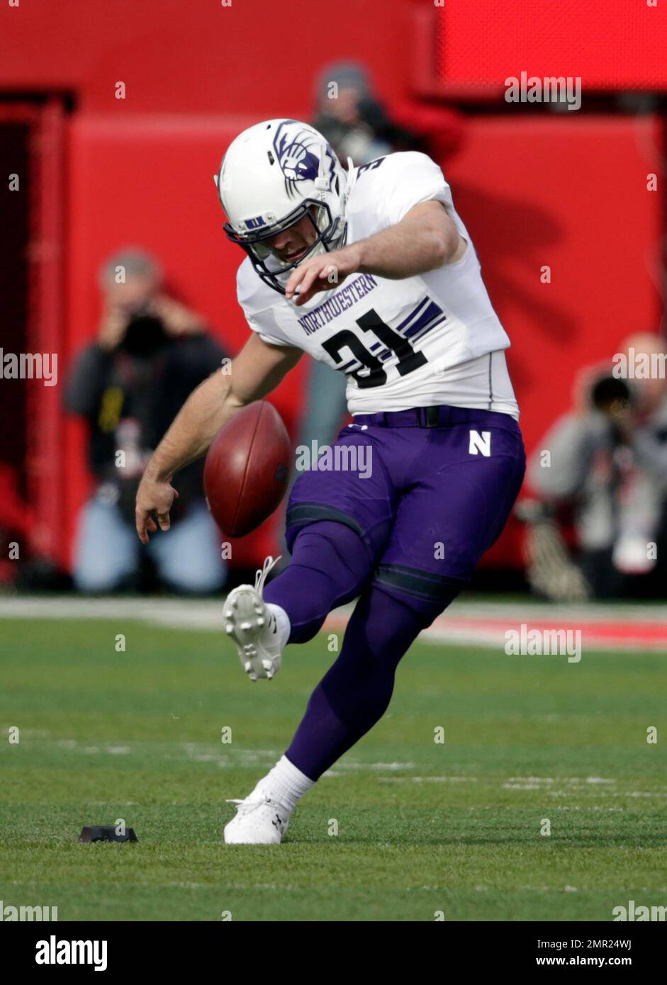 Northwestern kicker Luke Otto (31) kicks off during the first half of ...