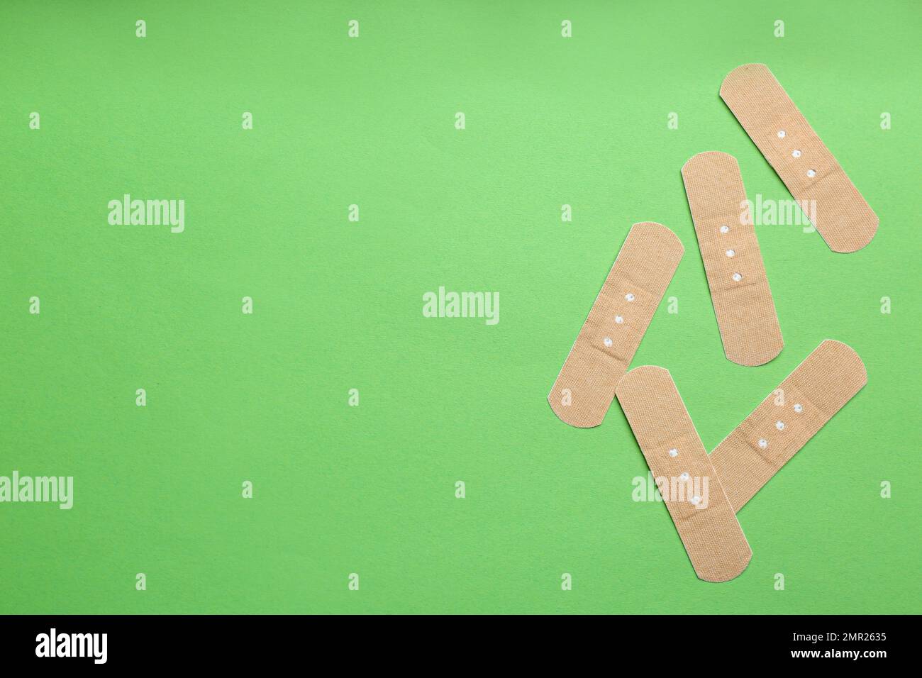 Green plasters hi-res stock photography and images - Alamy
