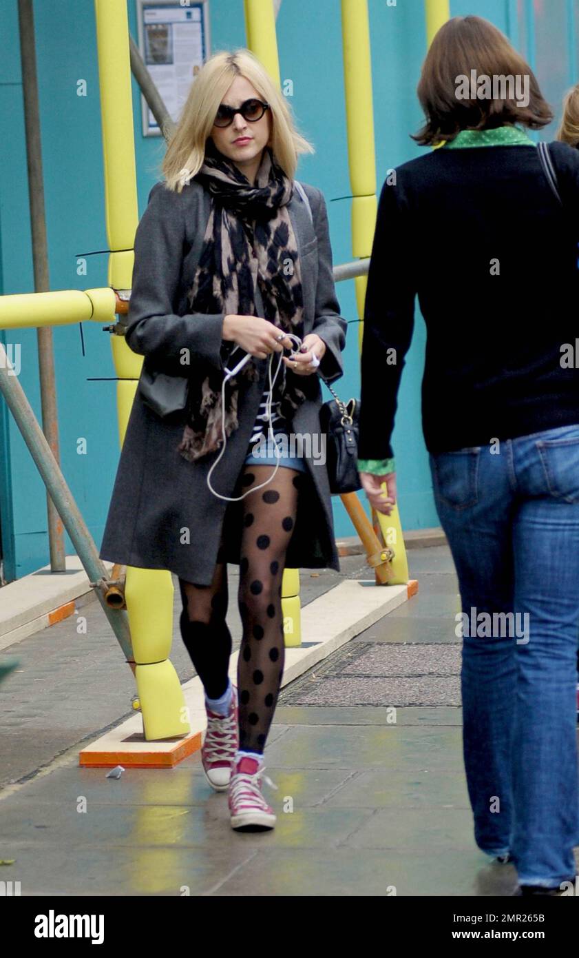 Fearne Cotton seen out an about in a grey trench coat, blue jean shorts ...