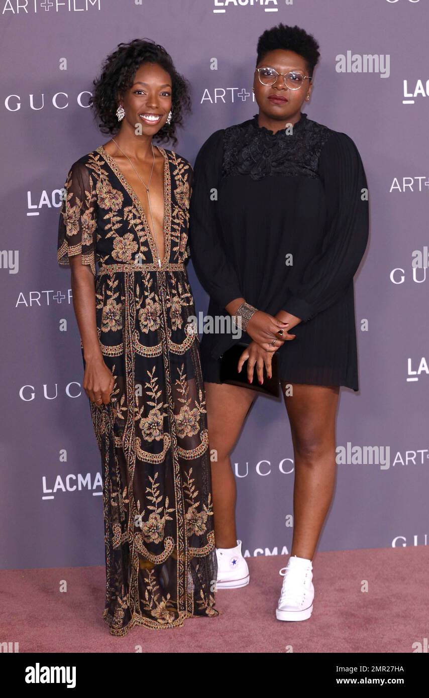 Elle Johnson, left, and Dime Davis arrive at the LACMA Art + Film Gala ...