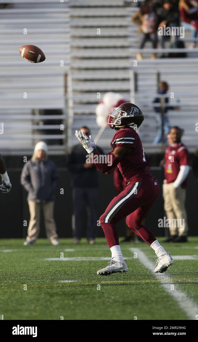 Fordham's Dylan Mabin #8 in action against Holy Cross during an NCAA ...