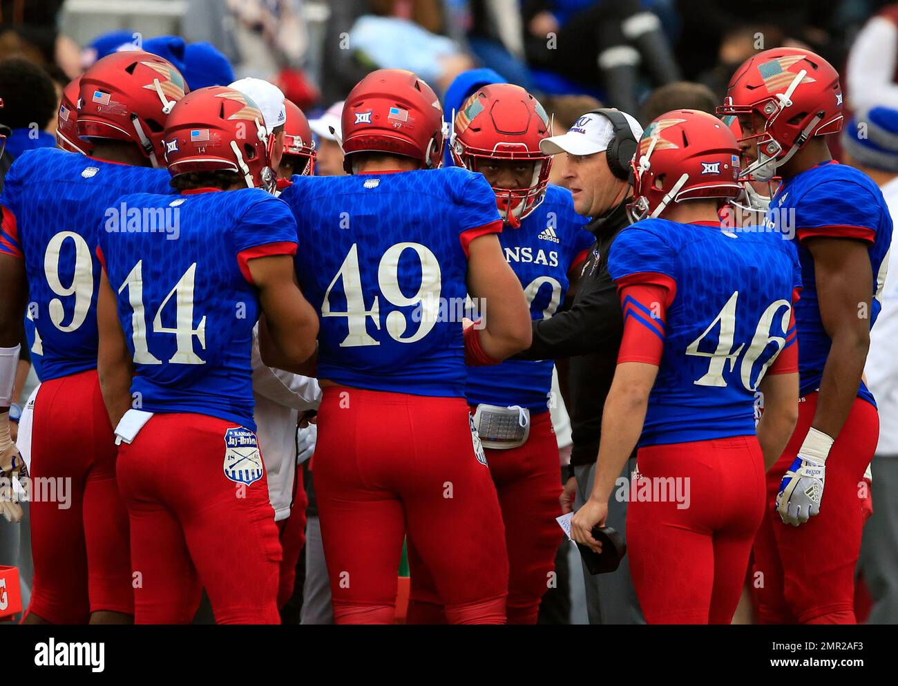 Kansas head coach David Beaty with team during the first half of an ...