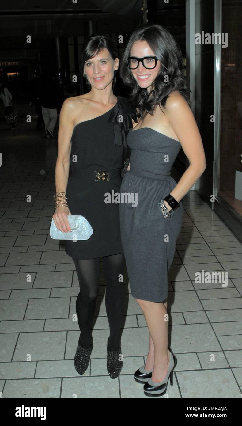 Perry Reeves and Abigail Spencer at the opening of the Fendi boutique ...