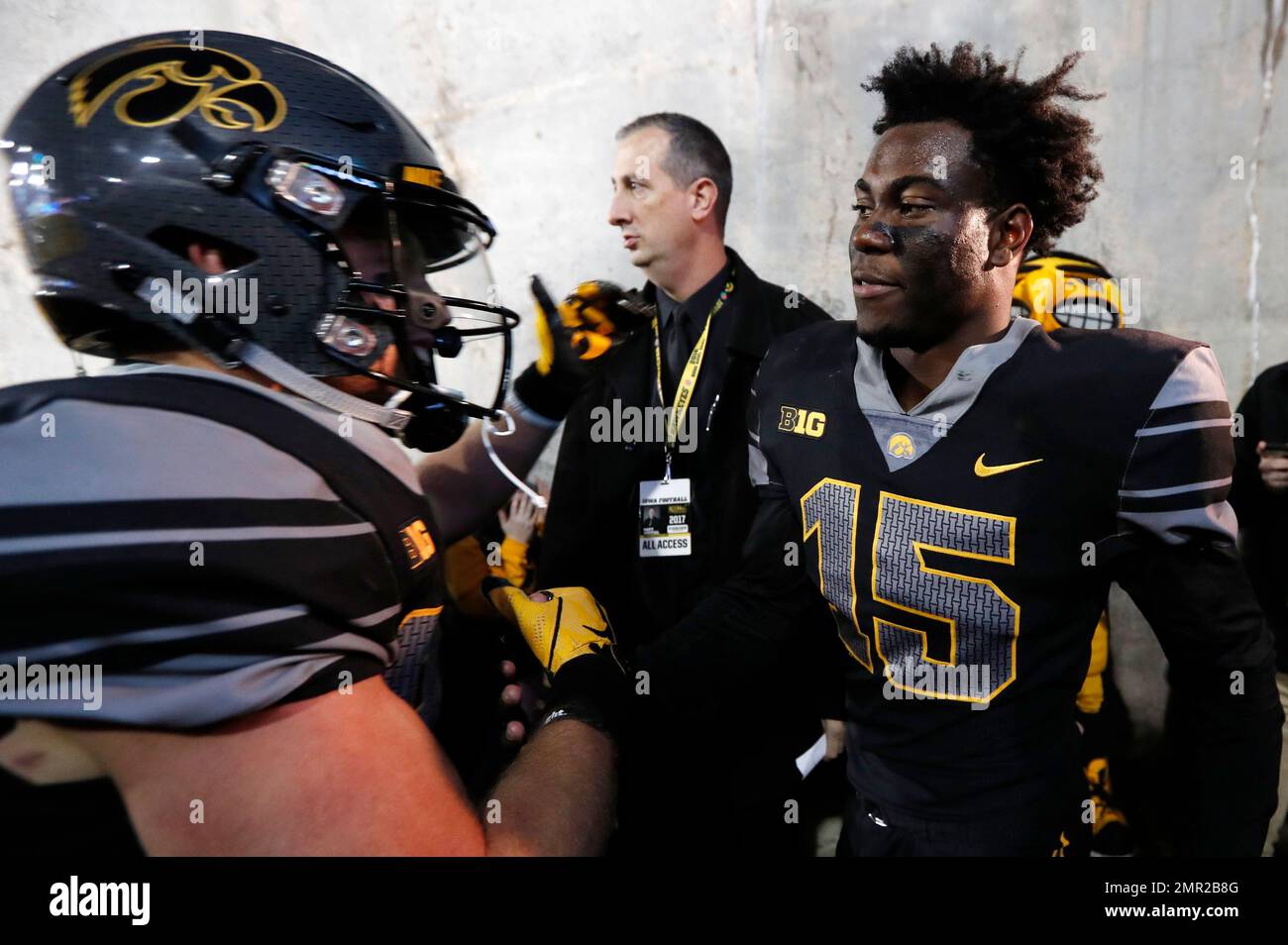 Iowa defensive back Joshua Jackson (15) celebrates with Nick Easley ...
