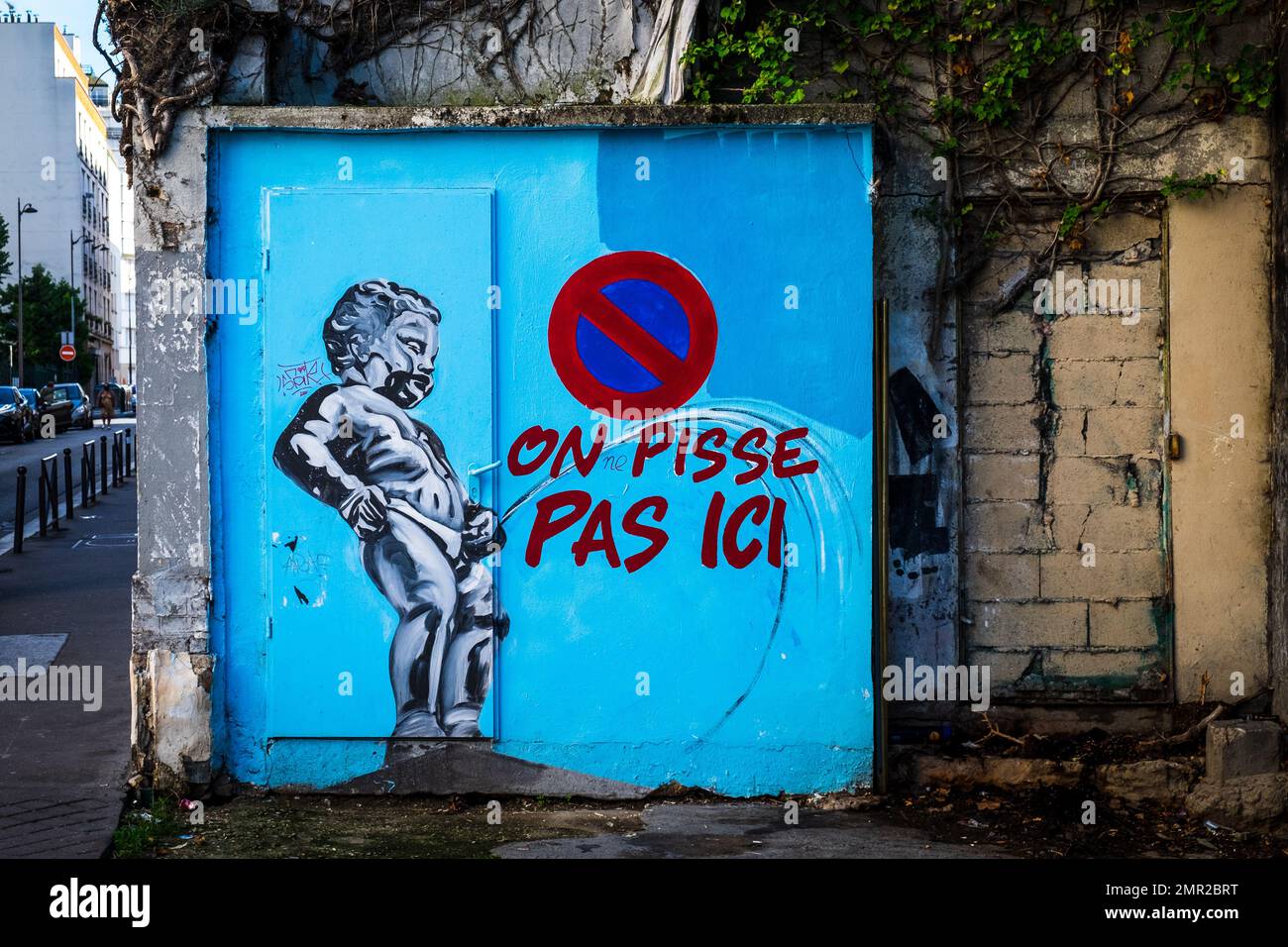 Paris, France, Oct 2022, view of a Manneken Pis mural warning not to ...