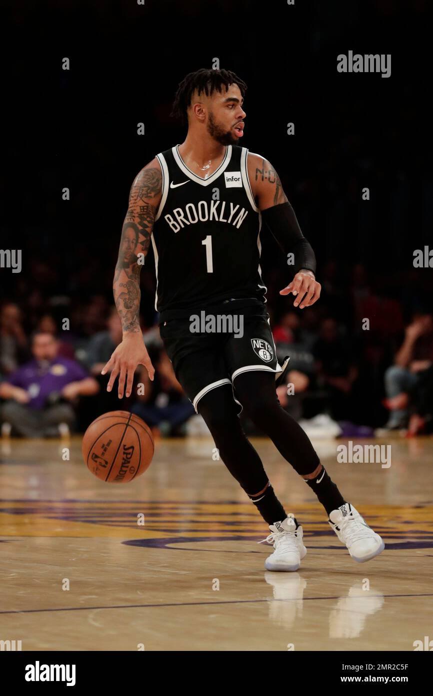 Brooklyn Nets guard D'Angelo Russell dribbles during the second half of ...