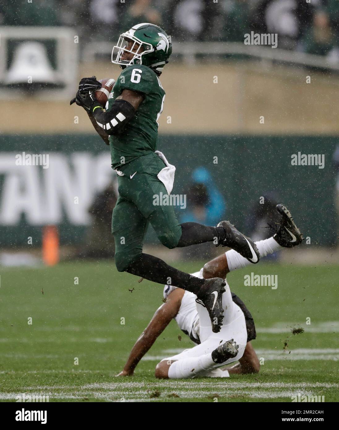 Michigan State safety David Dowell (6) intercepts a pass intended for ...