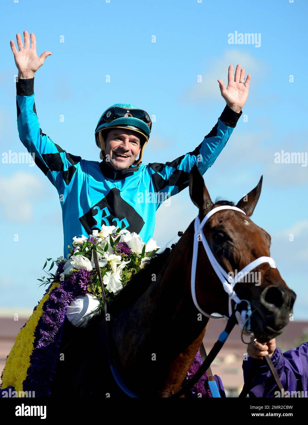 Kent Desormeaux celebrates after riding Roy H to victory in the ...