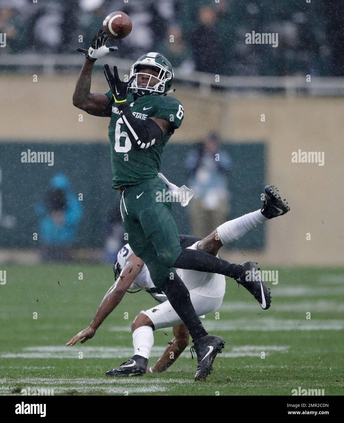 Michigan State safety David Dowell (6) intercepts a pass intended for ...