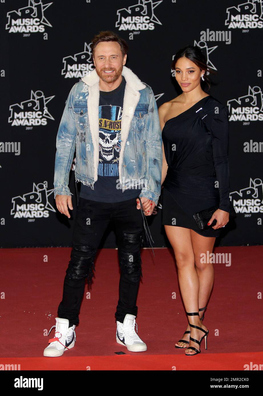 French DJ and producer of electro music, David Guetta, left, arrives ...