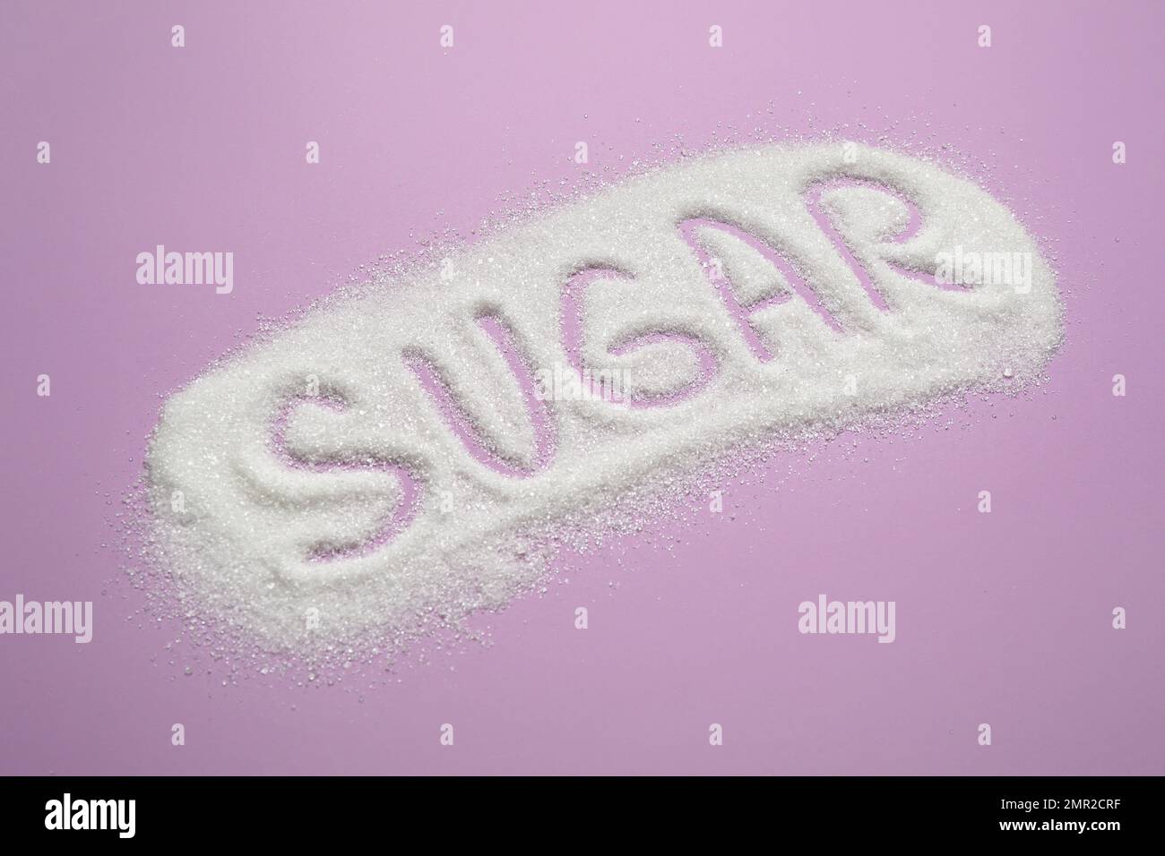 Word sweet written on sugar hi-res stock photography and images - Alamy