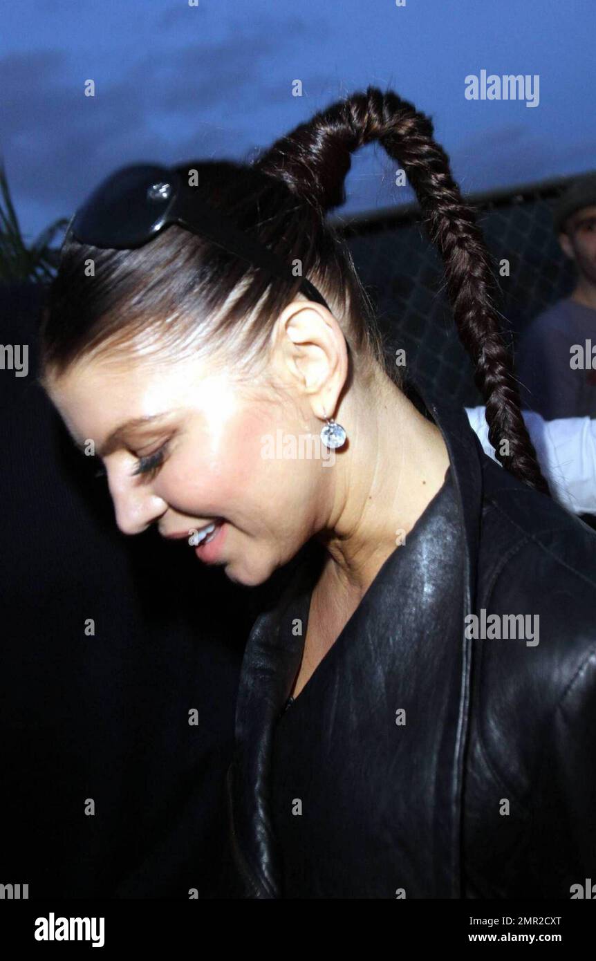 Fergie shows she is back in business and back in shape during her ...