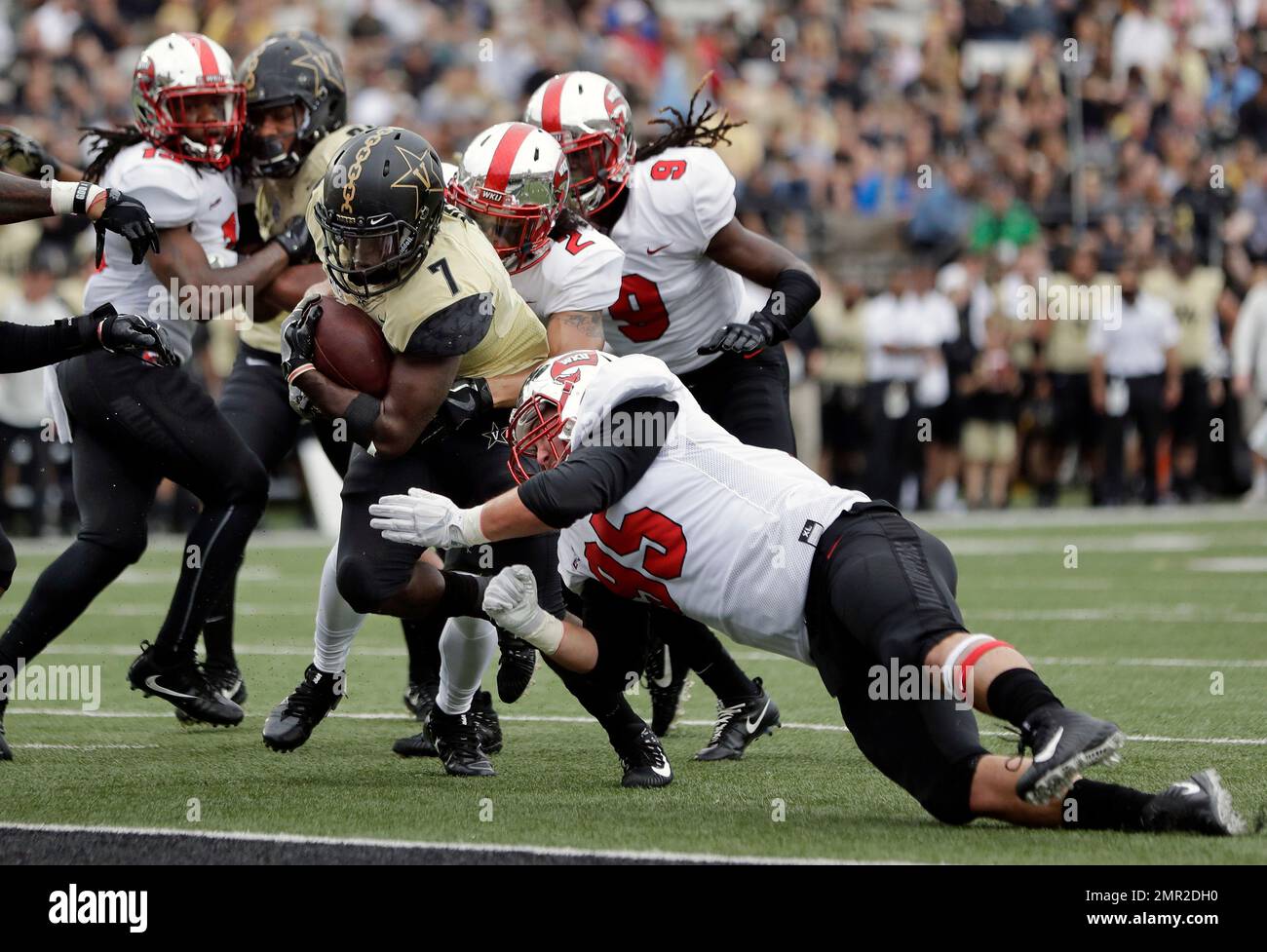 Vanderbilt running back Ralph Webb (7) scores a touchdown on an 8-yard ...