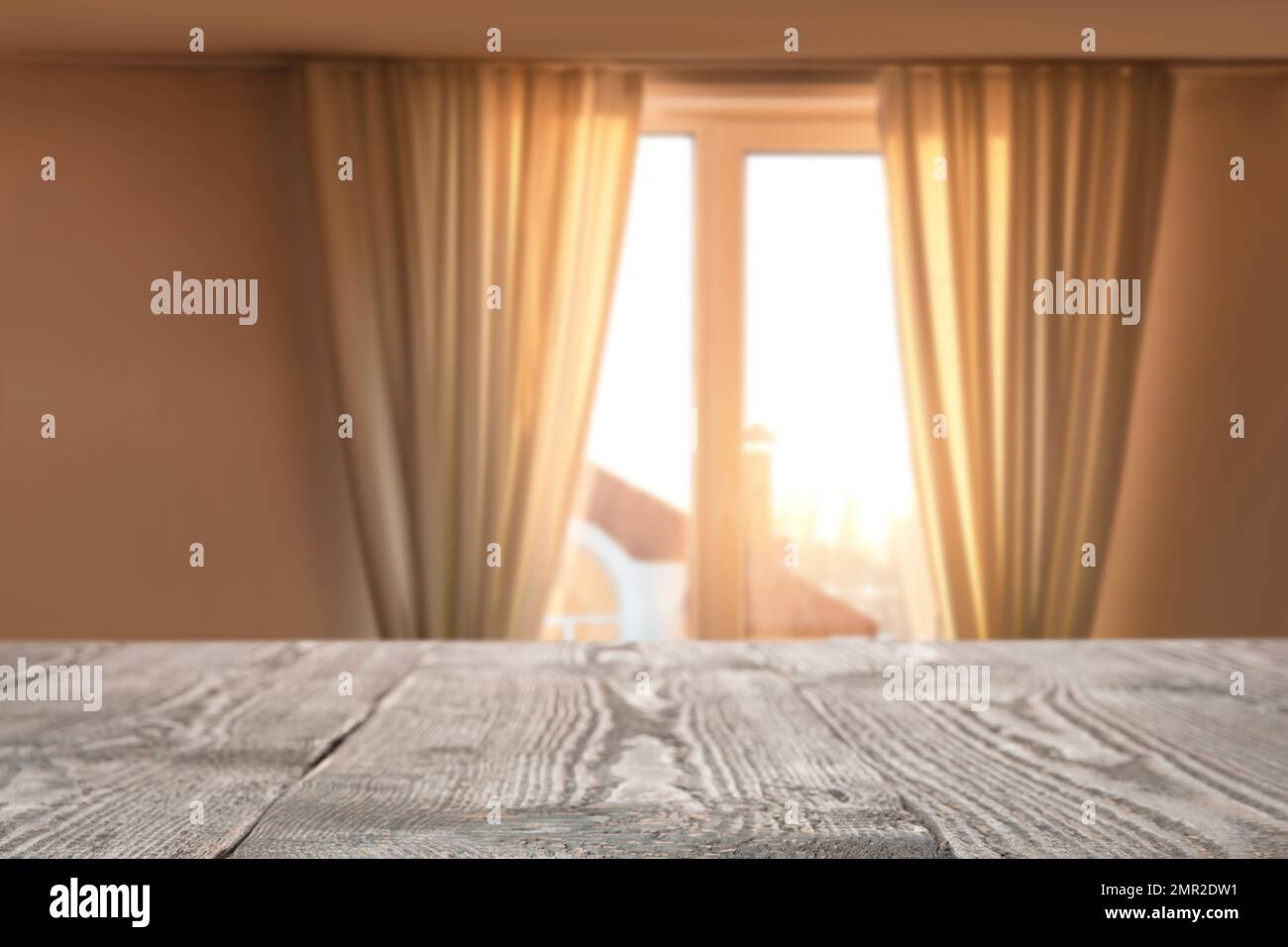 Empty wooden table in room. Space for design Stock Photo - Alamy