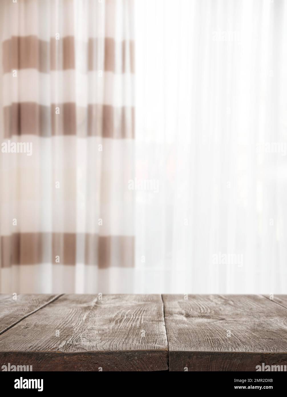 Empty wooden table in room. Space for design Stock Photo - Alamy