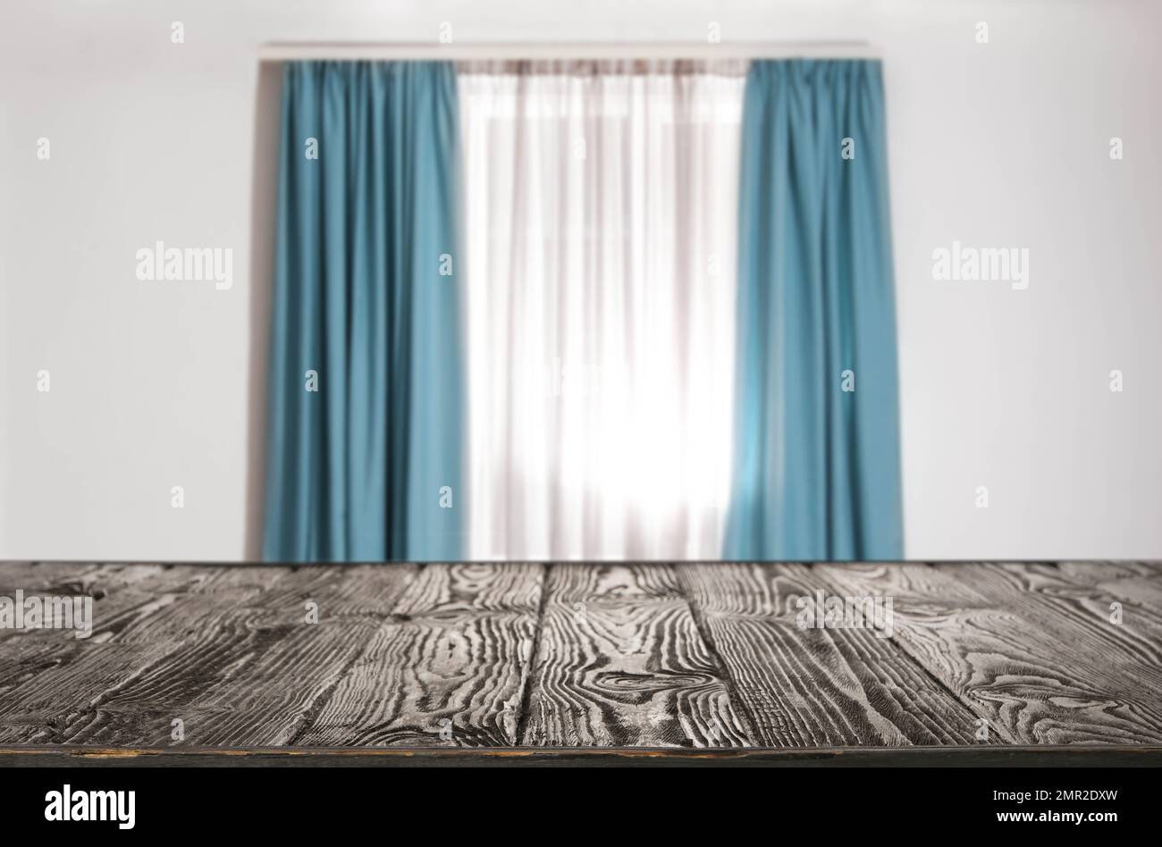 Empty wooden table in room. Space for design Stock Photo - Alamy