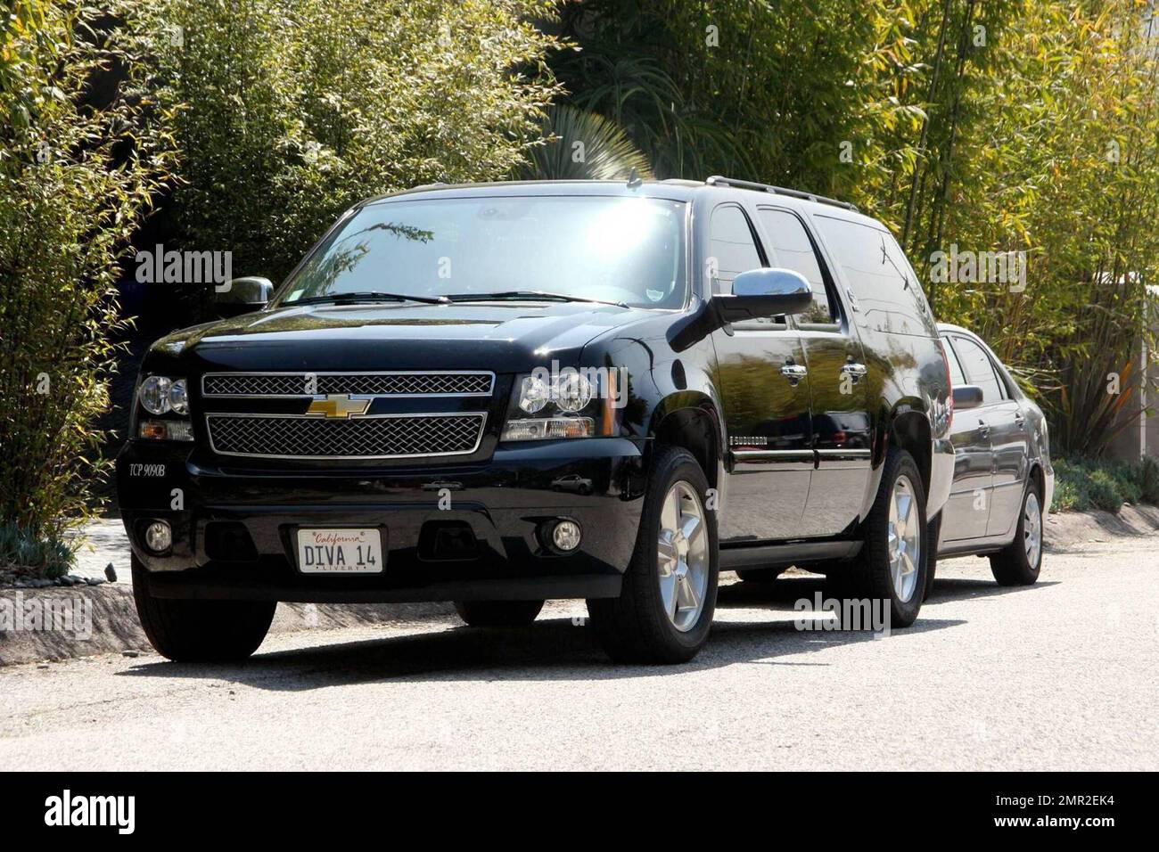 Singer Fergie leaves her home to meet a waiting SUV waiting to take her ...
