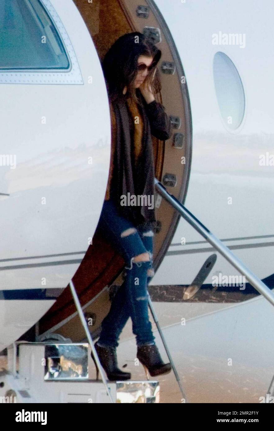 EXCLUSIVE!! Fergie chose some killer high heels for her flight on a ...