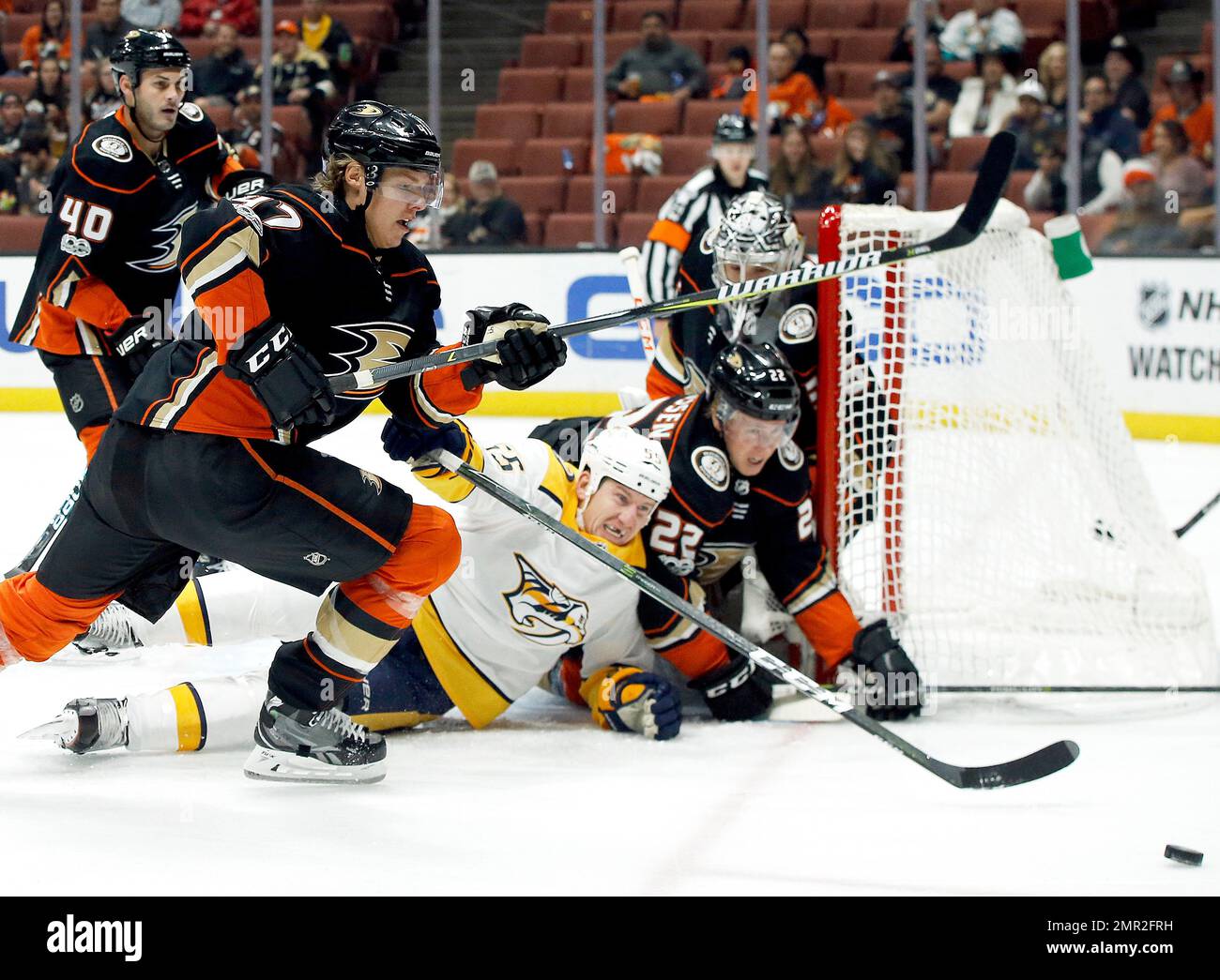 Nashville Predators left wing Cody McLeod, second from left, competes ...